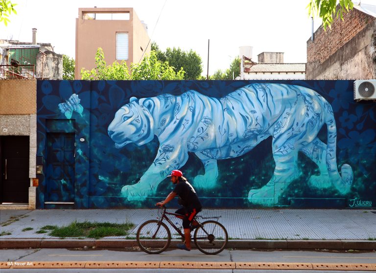 Julián Cruz Solano paints tiger mural in Parque Chacabuco | BA Street Art
