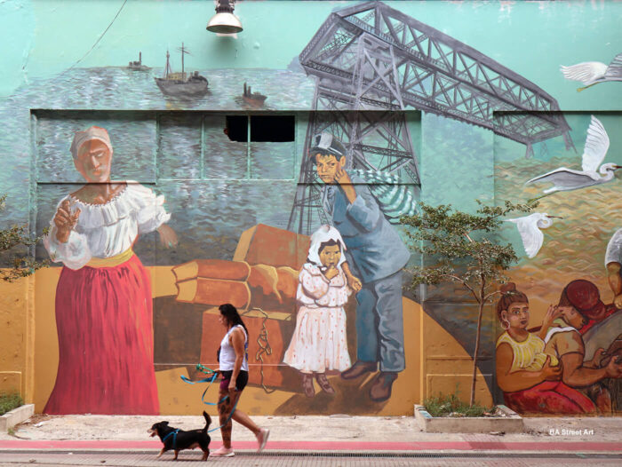 La Boca street art project with artists painting murals relating to ...